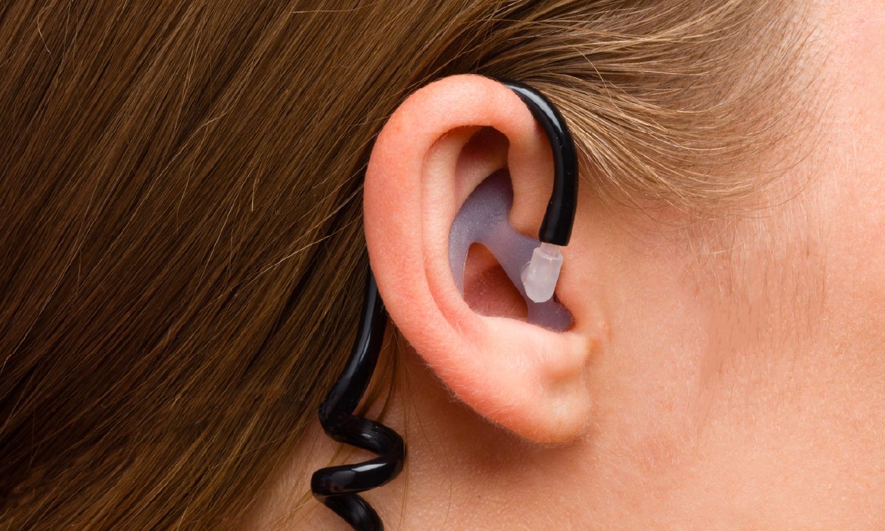 open_ear_insert_black_tube_woman_wearing_landscape_3_5 - EarHugger®