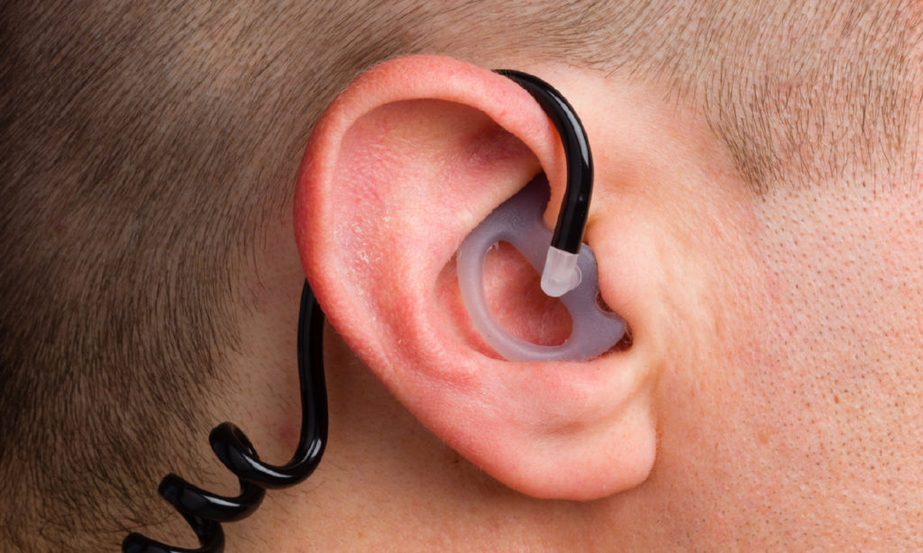 black_acoustic_tube_open_ear_insert_man_wearing_landscape_3_5 - EarHugger®